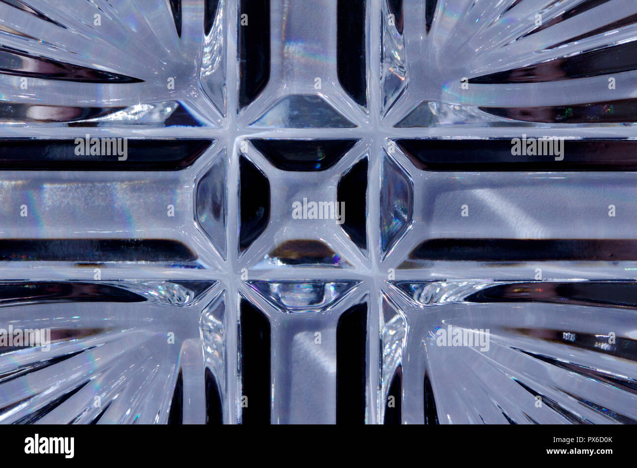 Macro background view of lead crystal glass surface with a cross design ...