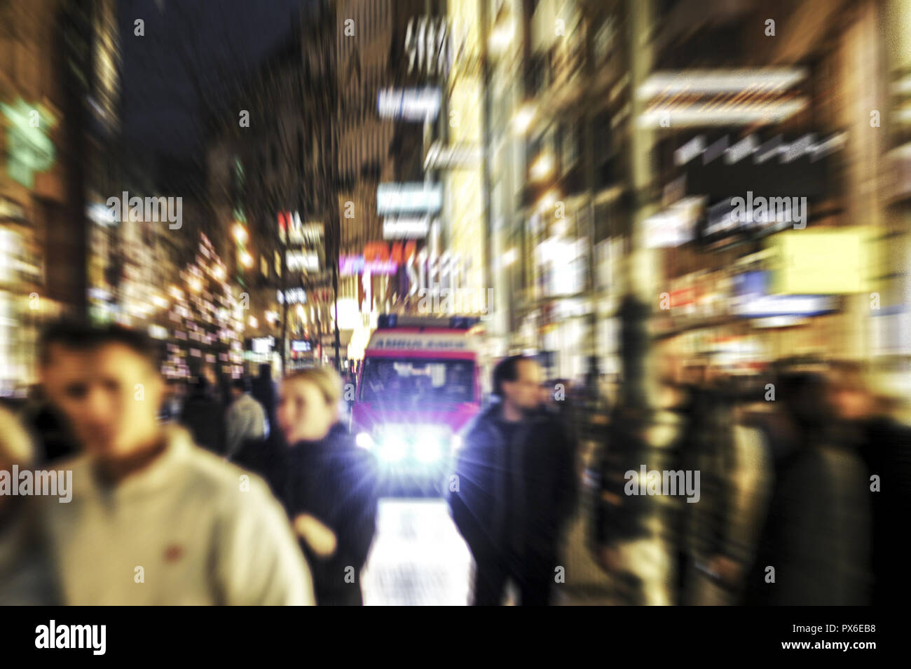 Vienna, Kaernterstrasse at dusk, Ambulance amidst the crowd, Austria, 1 ...