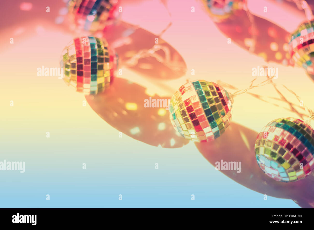 Frame of decoration party on pastel pink gradient background top view ...