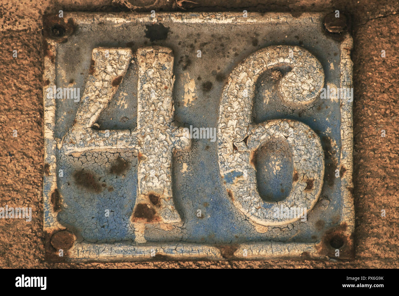 Old retro weathered cast iron plate with number 46 closeup Stock Photo ...