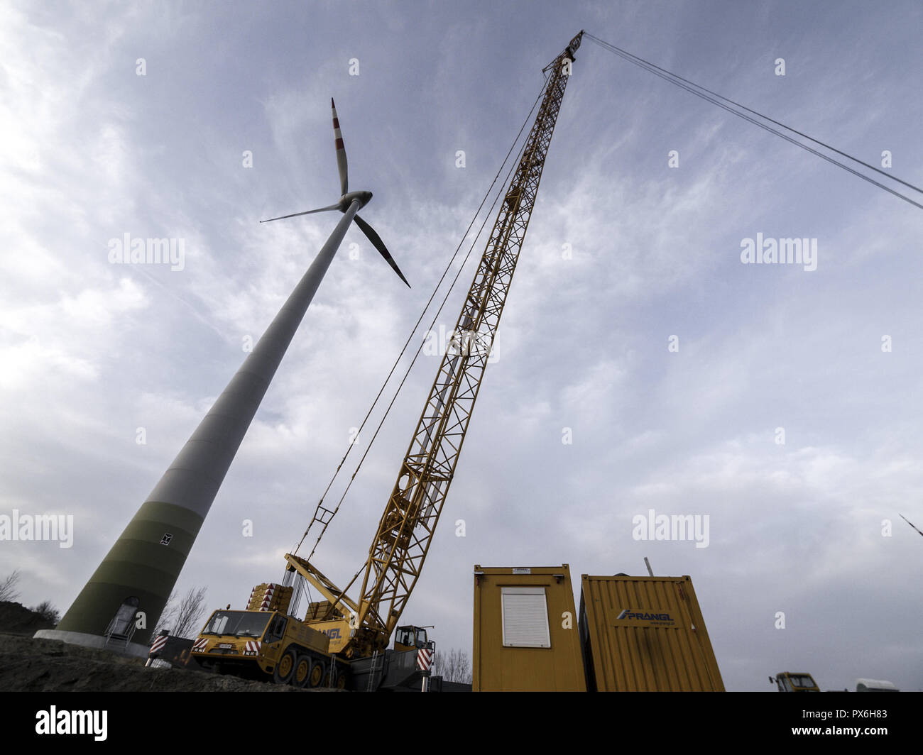 Wind wheel with crane at a construction site Stock Photo - Alamy