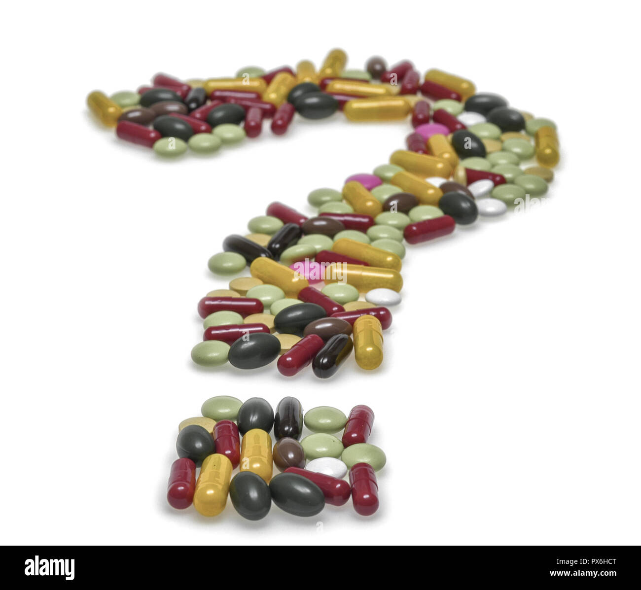 Pills, question, symbol, symbol for the questionable future of medicine ...