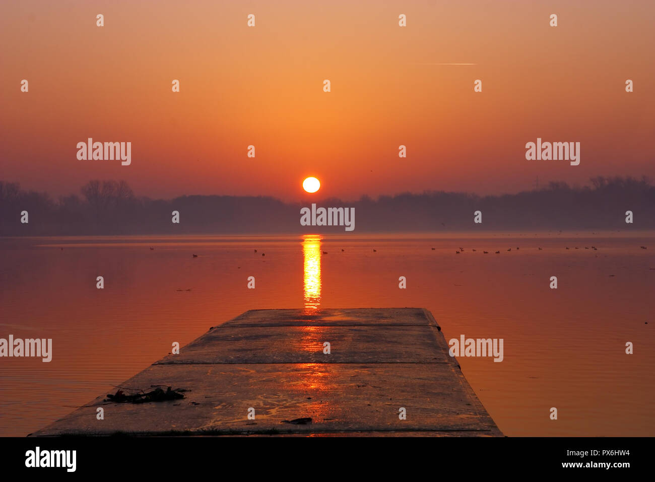 Colorful dawn on the beach Stock Photo - Alamy