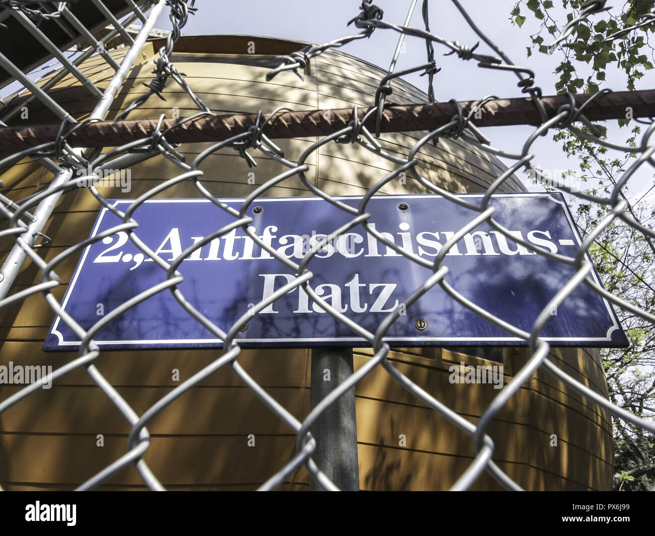 Vienna, Prater Sign Antifaschismus-Platz behind chain-link fence ...