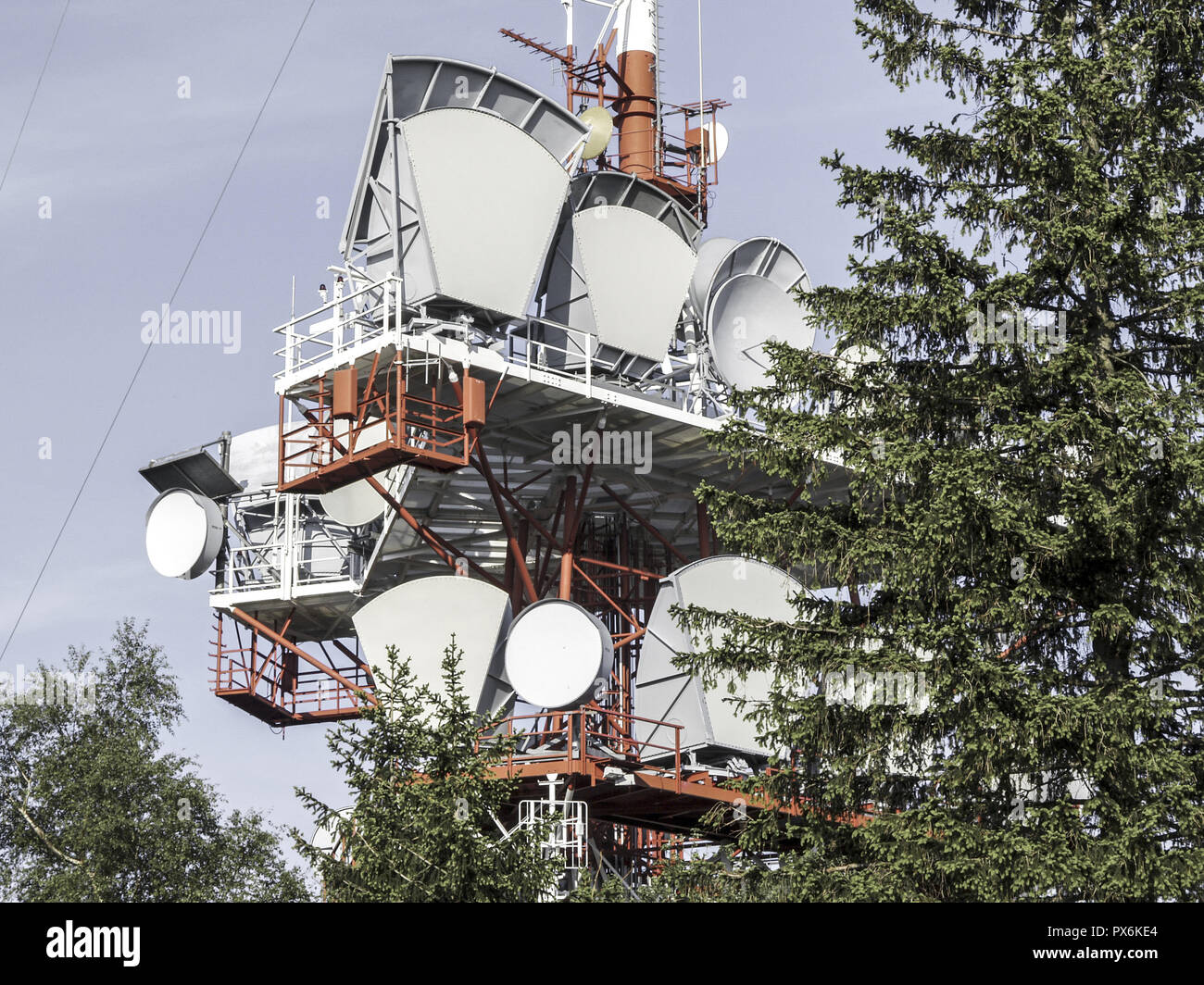 Radio tower with satellite dish Stock Photo - Alamy