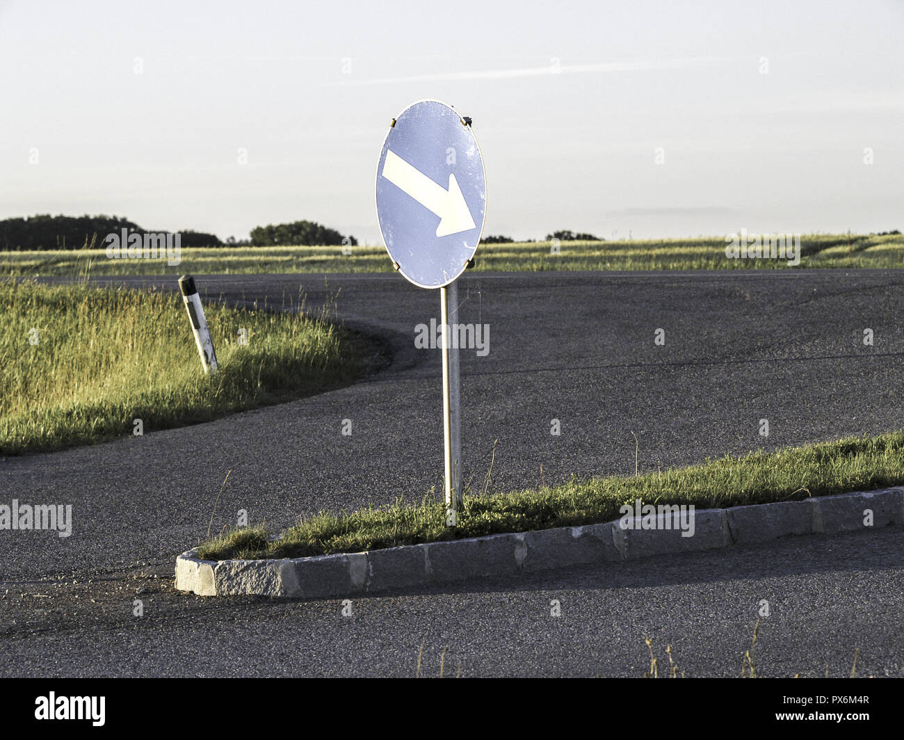 Traffic sign, arrow, keep right Stock Photo - Alamy
