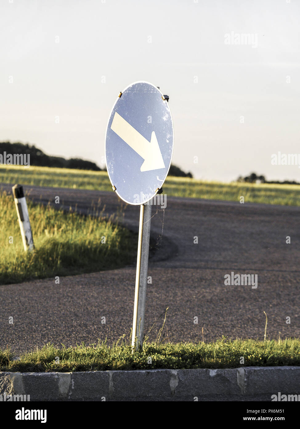 Traffic sign, arrow, keep right Stock Photo - Alamy