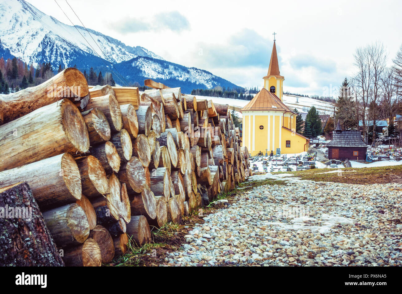 Church of Virgin Mary Visitation with cemetery and wooden beams in ...