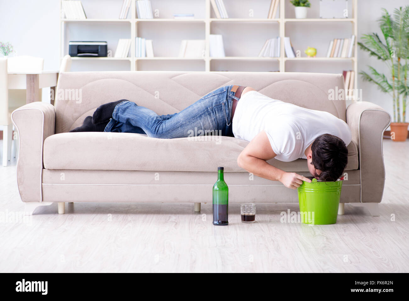 Sick man suffering at home from infection and bad stomach Stock Photo ...