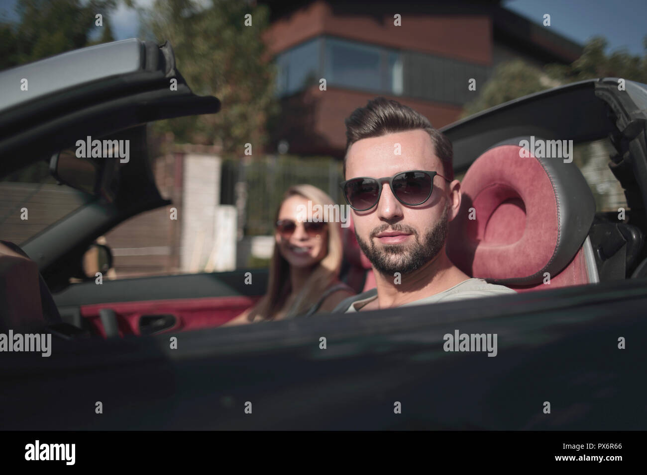 modern man driving a convertible car Stock Photo - Alamy