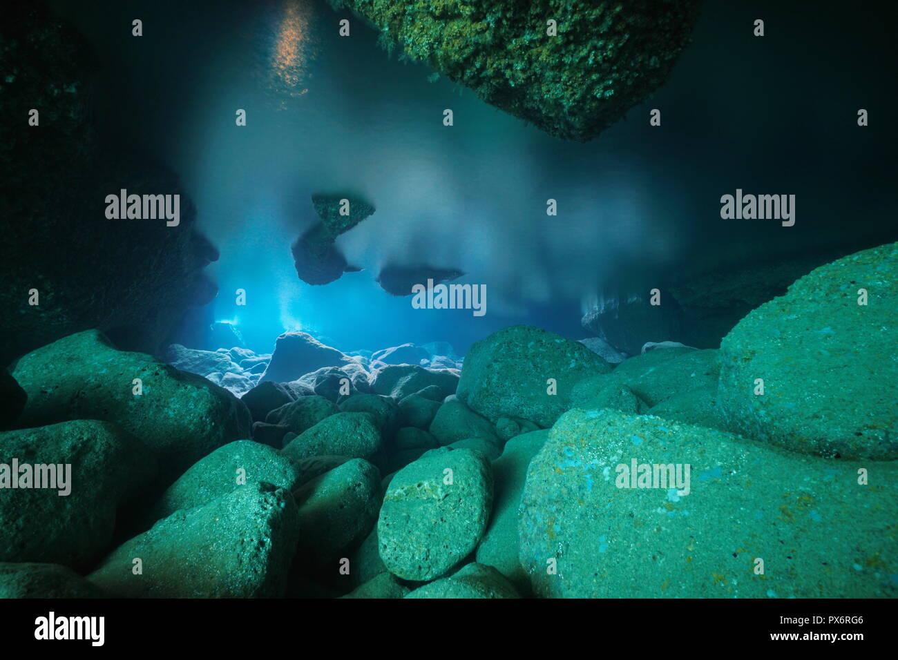 Rocks underwater inside a shallow cave in the Mediterranean sea ...