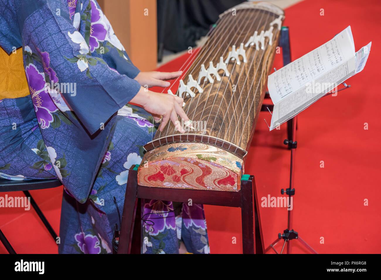 Playing koto hi-res stock photography and images - Alamy