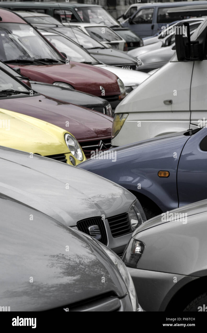 Parking cars, face to face Stock Photo - Alamy