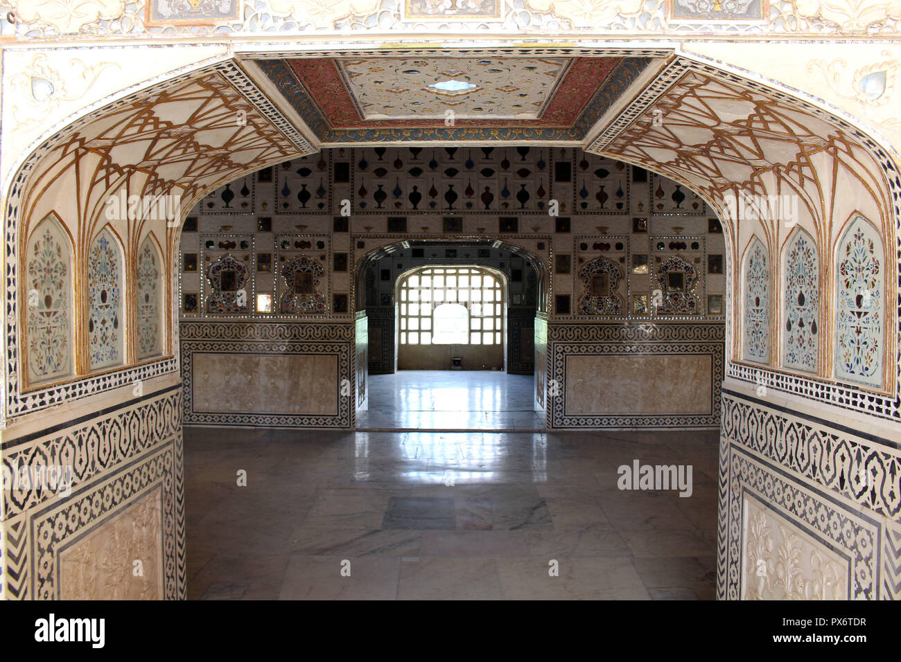 The details of intricate carvings around the Amer (or Amber Fort ...