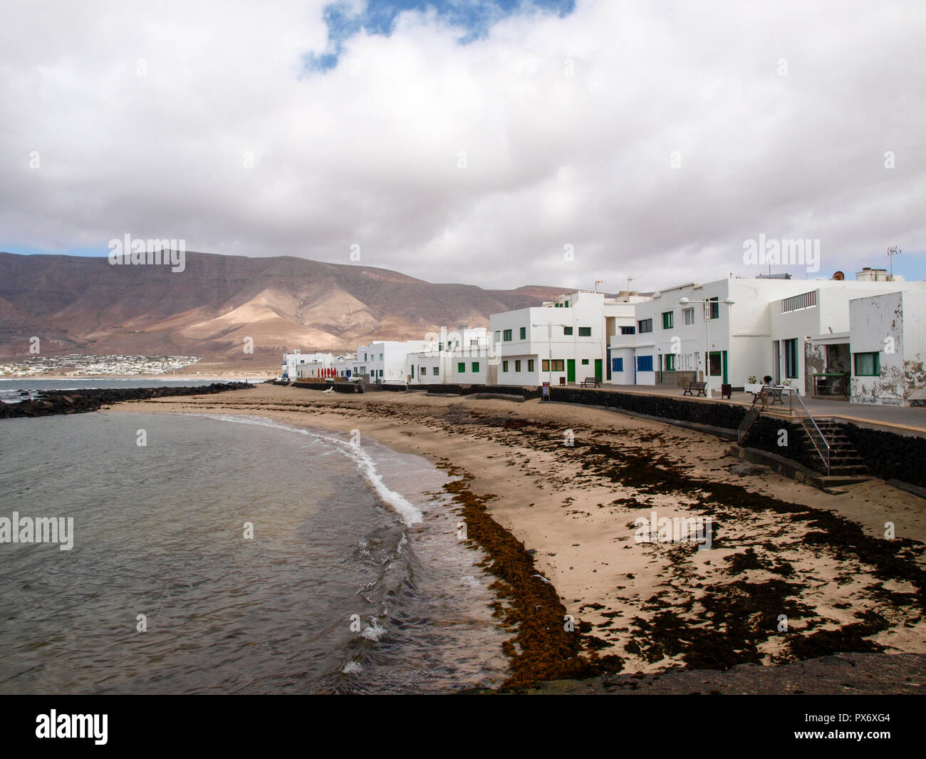 Caleta de famara beach sand building hi-res stock photography and ...