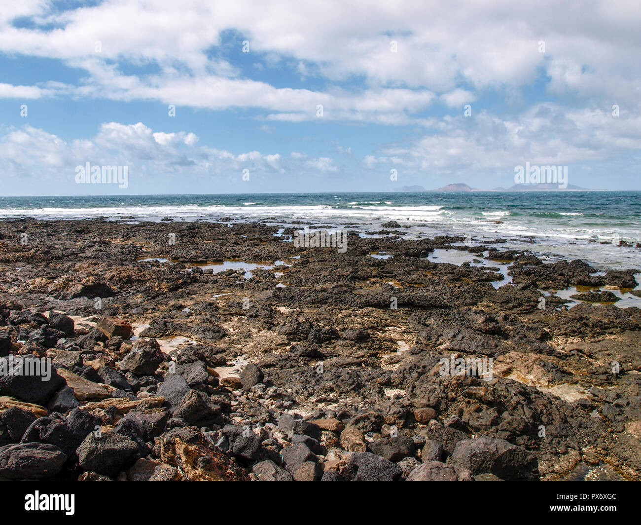 Caleta de famara beach sand building hi-res stock photography and ...