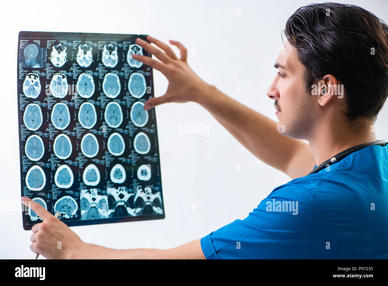 Young handsome doctor radiologyst working in hospital Stock Photo - Alamy