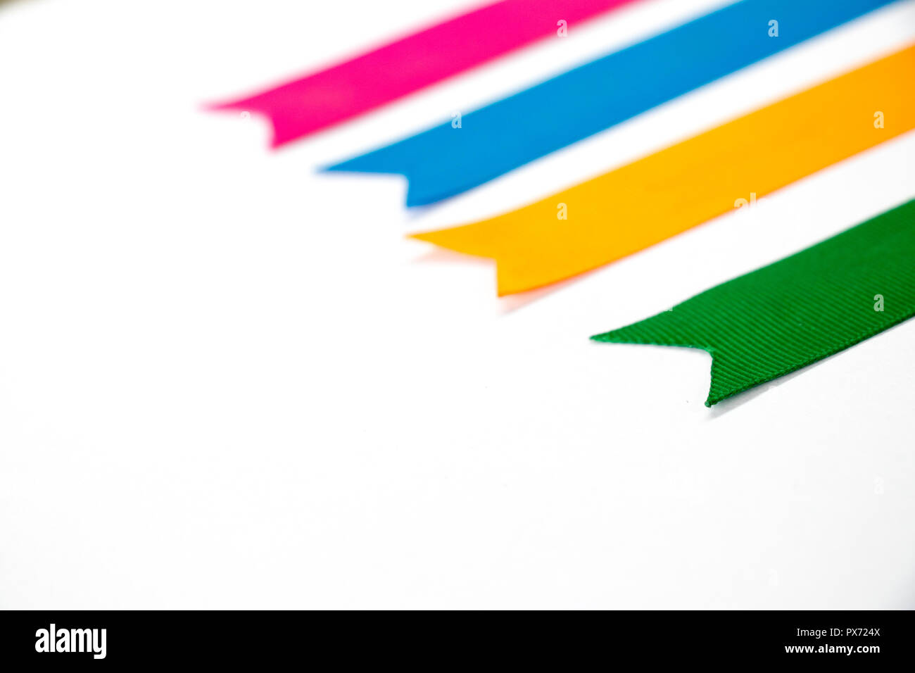 Colorful ribbon (Pink, blue, orange, yellow, green) on white background ...