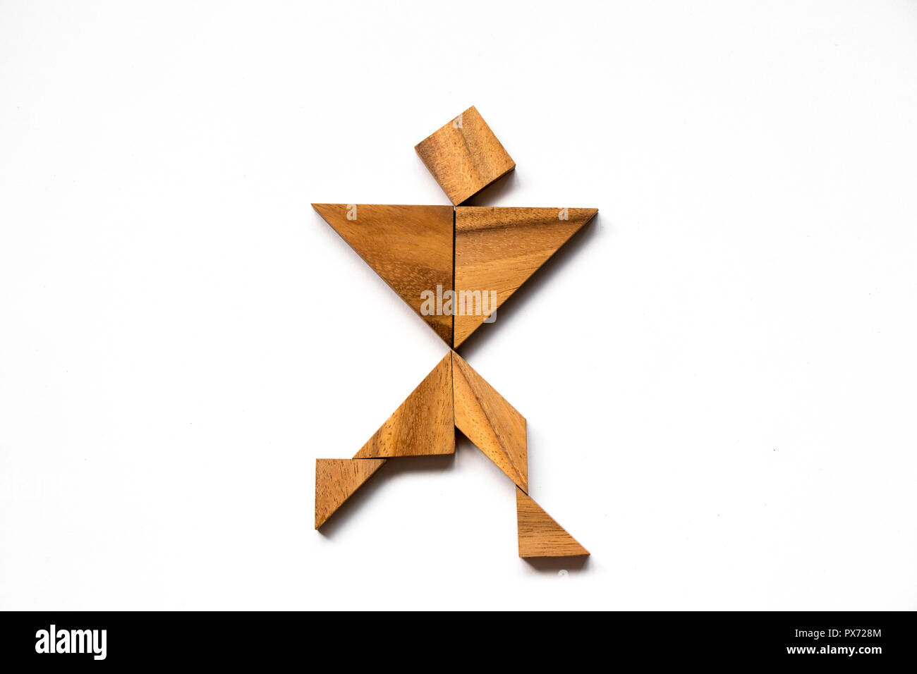 Wooden tangram as happy man shape on white background (Concept as ...