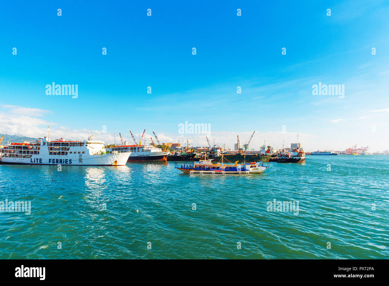 CEBU, PHILIPPINES - FEBRUARY 23, 2018: View of the ships in the port ...