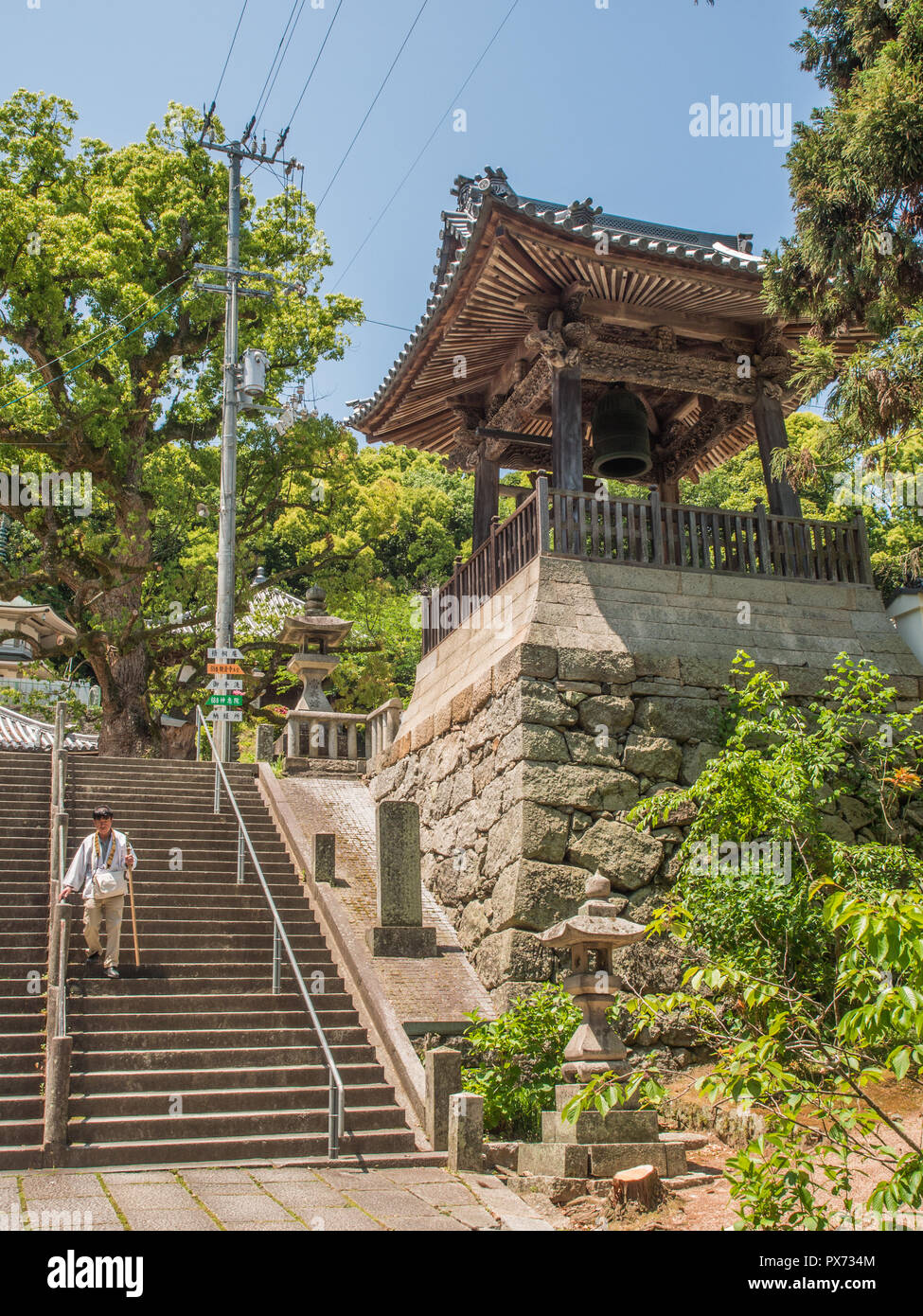 Henro pilgrim walking down steps, Kanonji temple, Kagawa, Shikoku ...