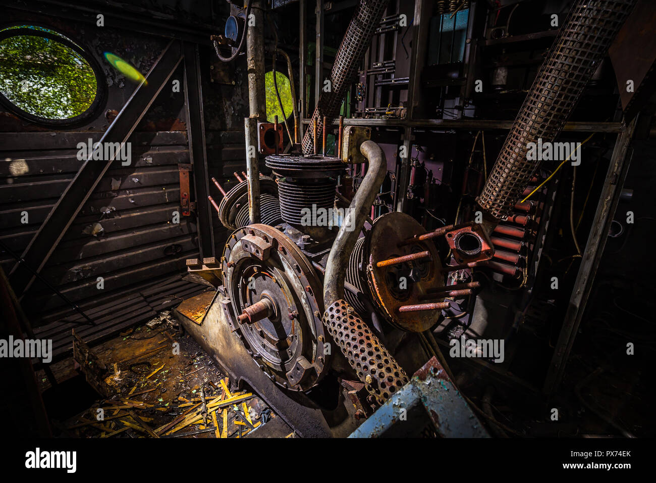 Colorful partially dismantled engine of old diesel locomotive, urbex ...