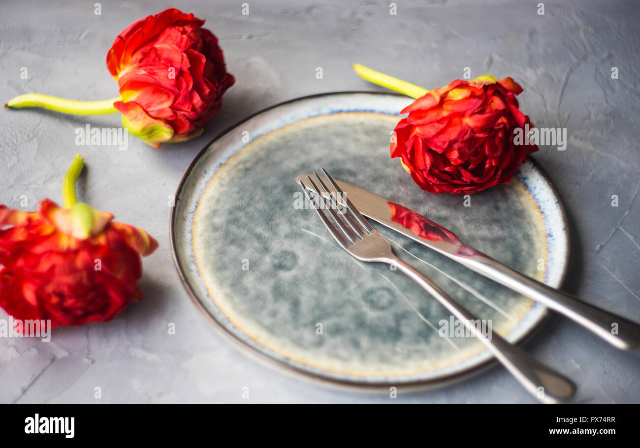 Summer table setting decorated with Red Princess tulips on rustic ...