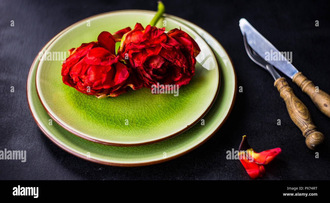 Summer table setting decorated with Red Princess tulips on rustic ...