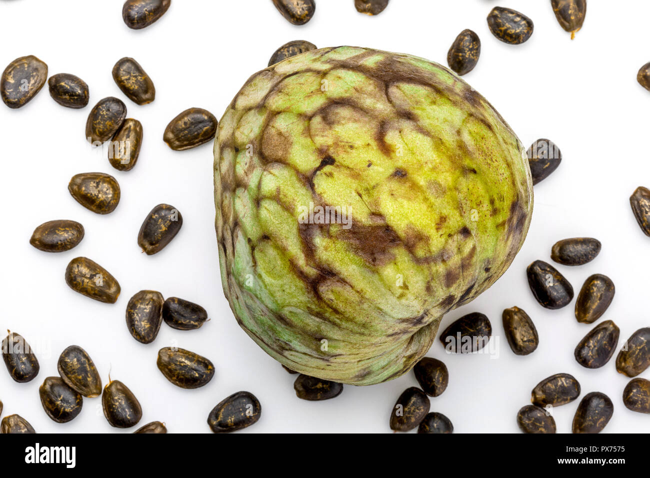 Mature cherimoya. Whole fruit and nuggets on white background Stock ...