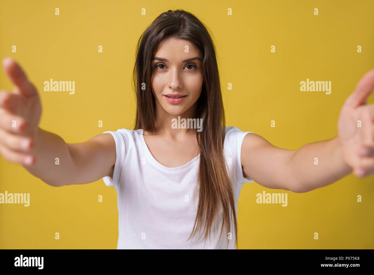 Pleasant attractive girl making selfie in studio and laughing. Good ...