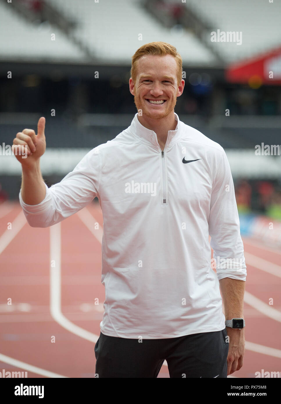 Long Jumper Greg Rutherford of GBR poses for a photo after his final ...