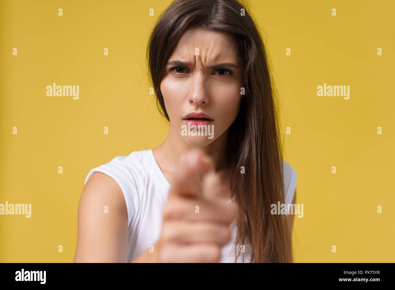 Close up portrait of an attractive young caucasian woman with an angry ...