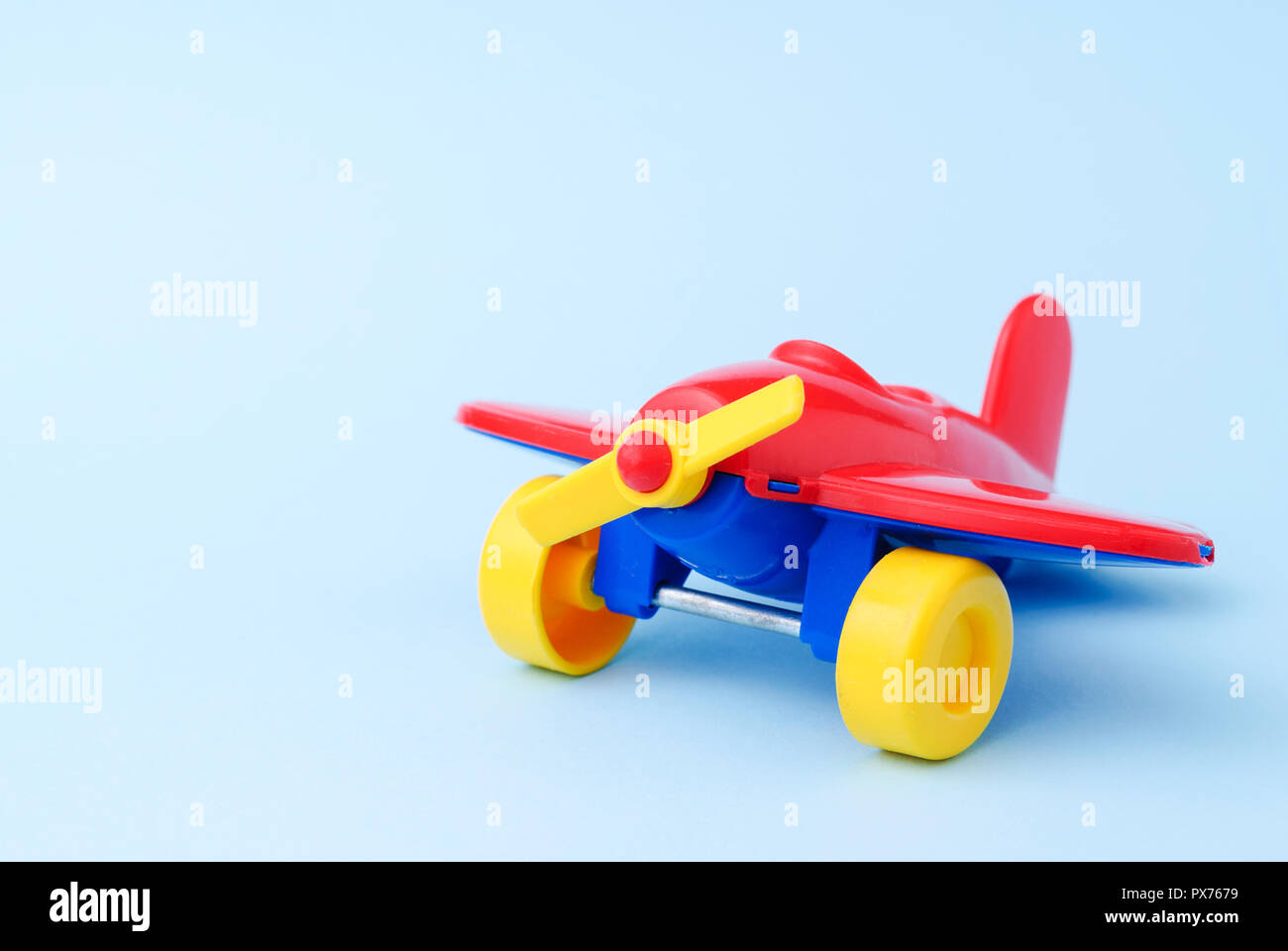 Child red toy plane hi-res stock photography and images - Alamy