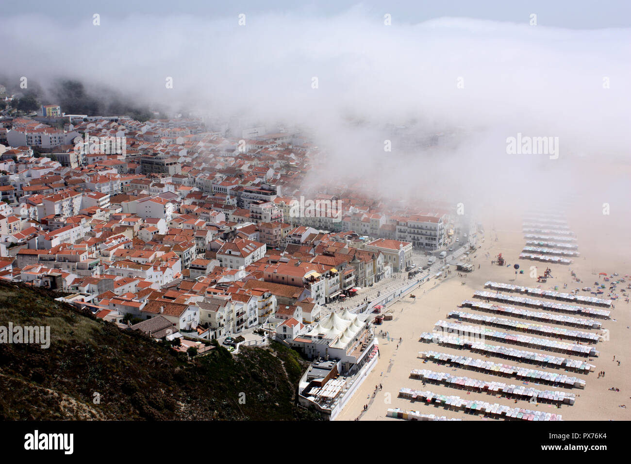 A sea haar over the beach at Nazare in western Portugal Stock Photo - Alamy