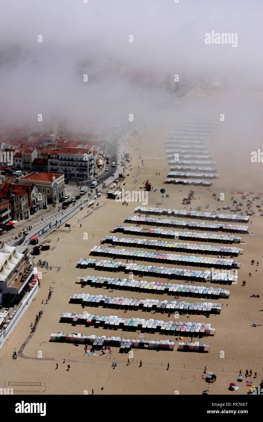 A sea haar over the beach at Nazare in western Portugal Stock Photo - Alamy