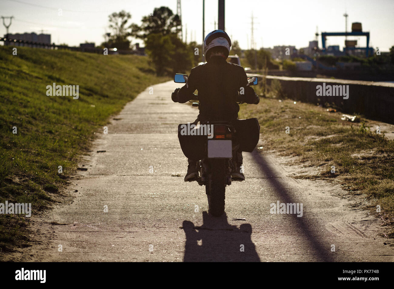 Back view of a motorcyclist Stock Photo - Alamy
