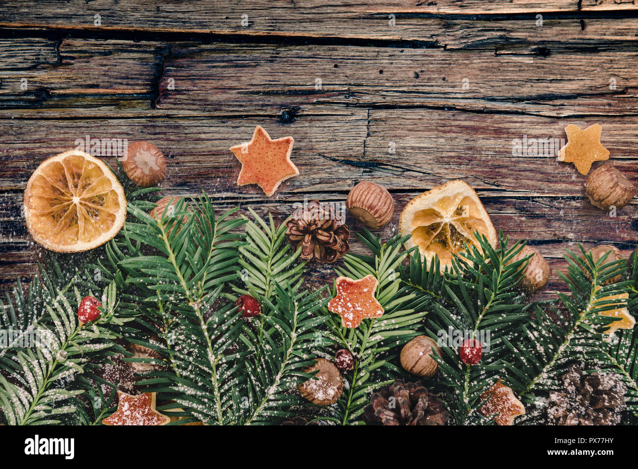Christmas border design on the wooden background Stock Photo - Alamy