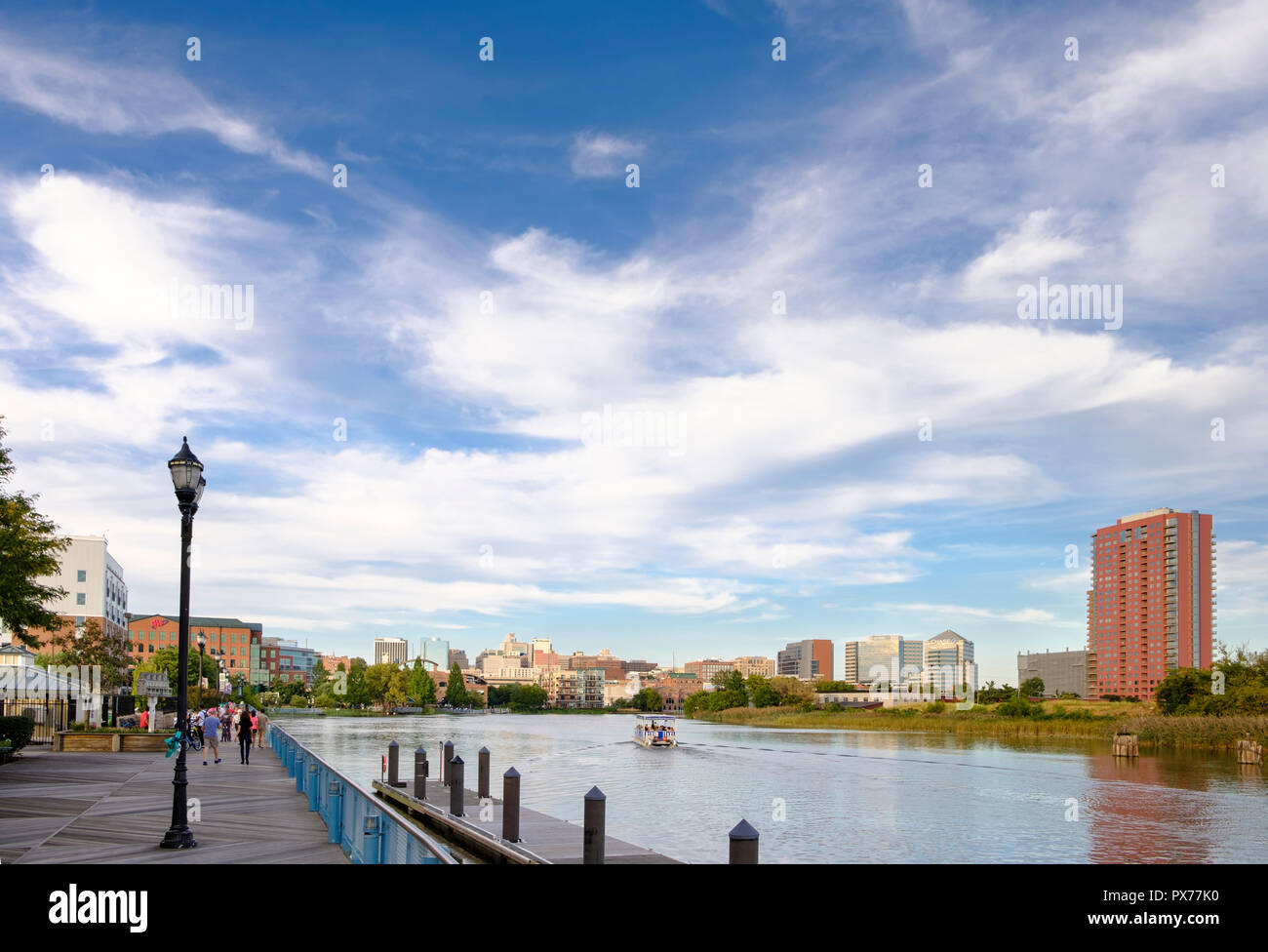 The Riverwalk with skyline in summer and Christiana River with River ...