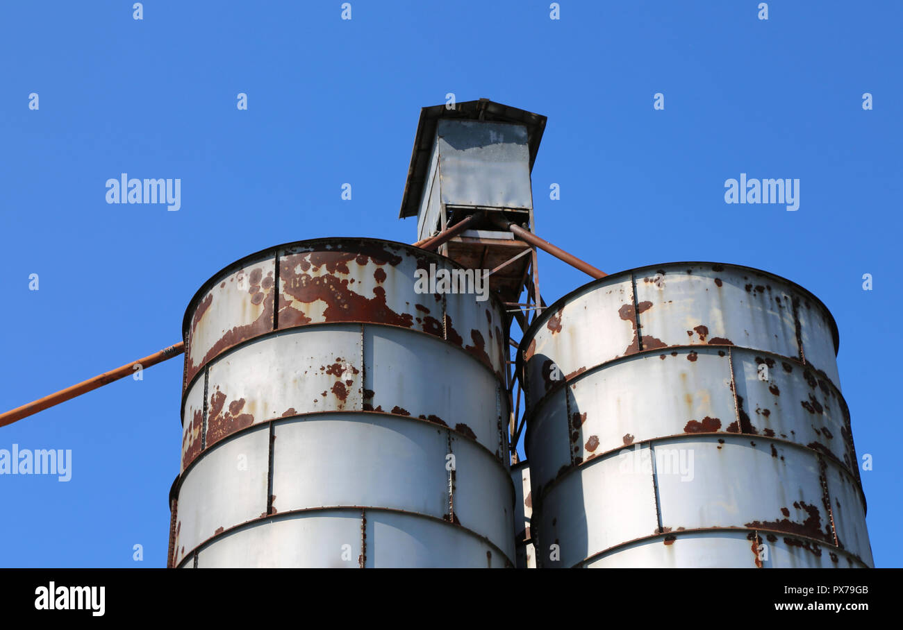 old abandoned metal silos used once to contain animal feed Stock Photo ...