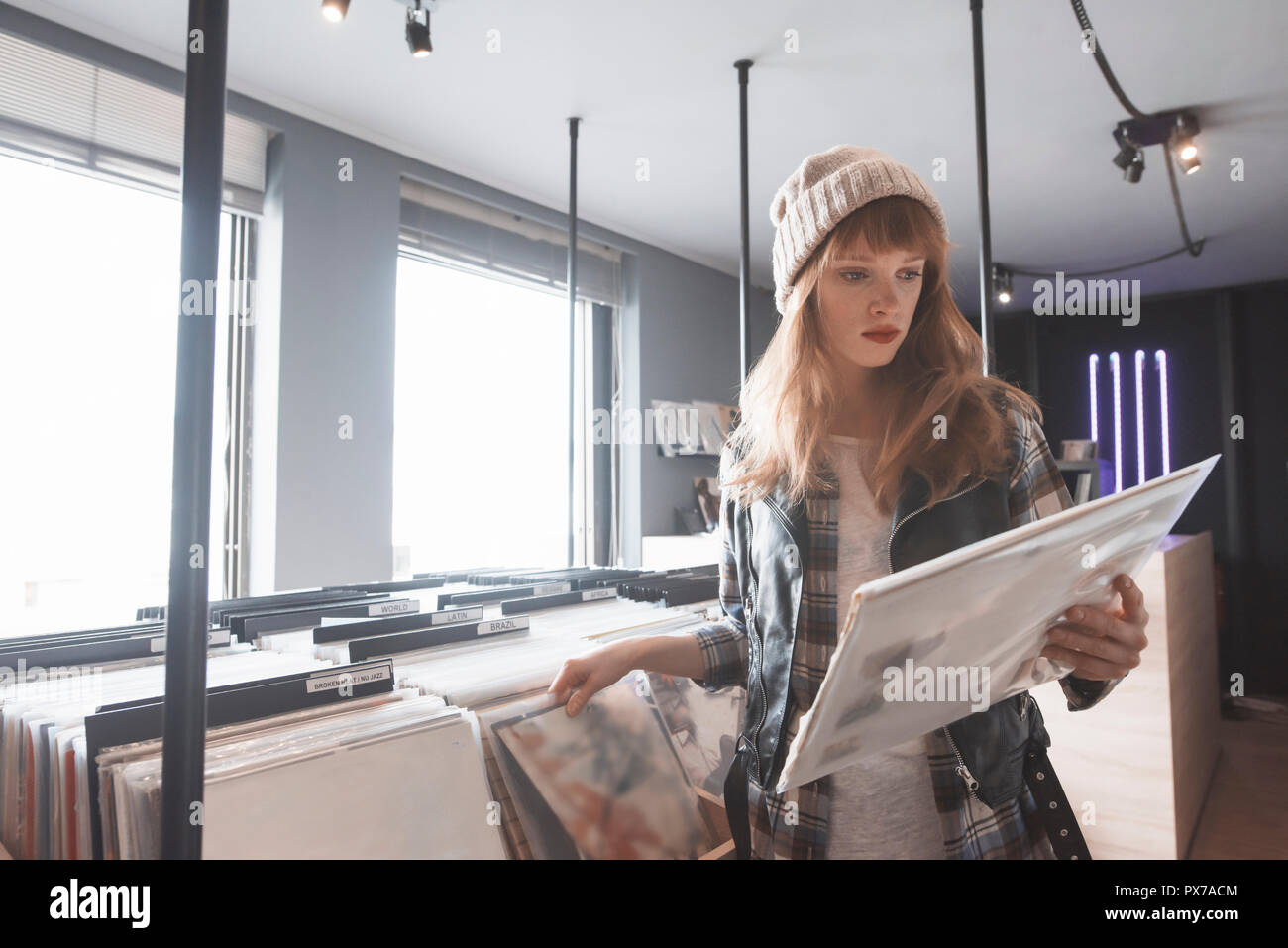 Hand holding vinyl record in hi-res stock photography and images - Alamy