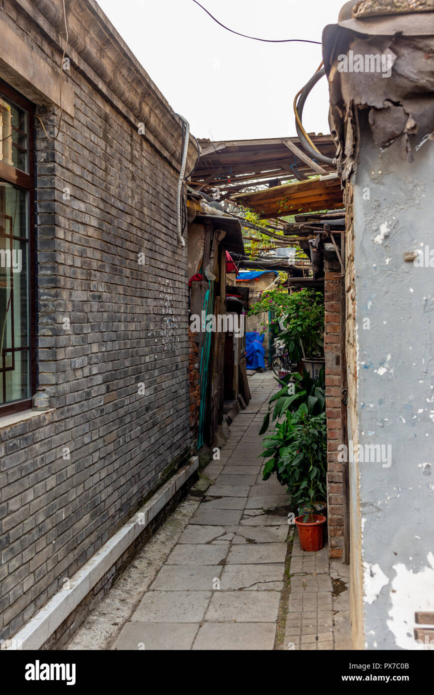 The narrow alley of a traditional hutong in Beijing at sunrise - 5 ...