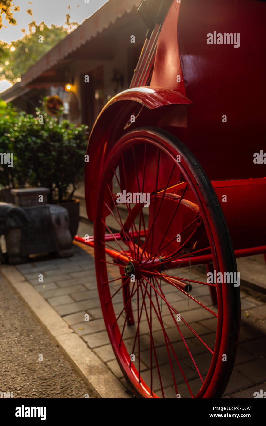 A bright red rickshaw in a back alley in a Beijing hutong - 2 Stock ...