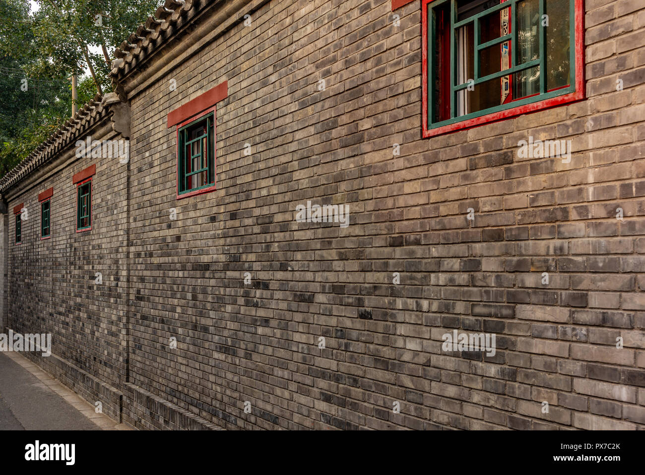The narrow alley of a traditional hutong in Beijing at sunrise - 6 ...