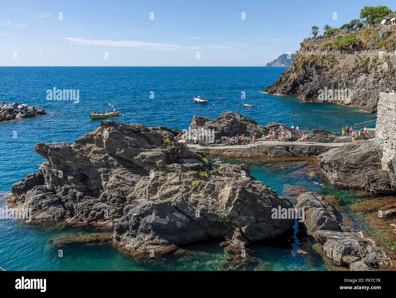 View of the beach and the paths of Manarola, Cinque Terre, Liguria ...