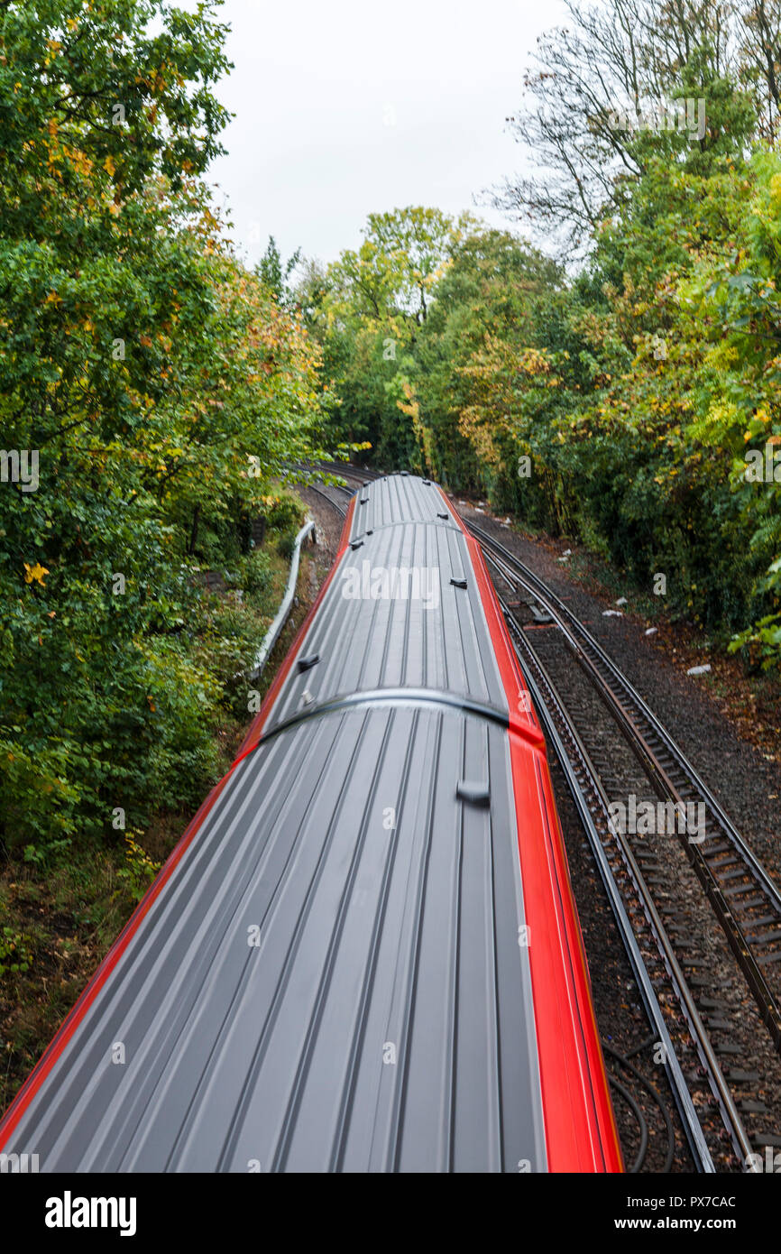 A overhead view of a train leaving the station at Teddington,England,UK ...