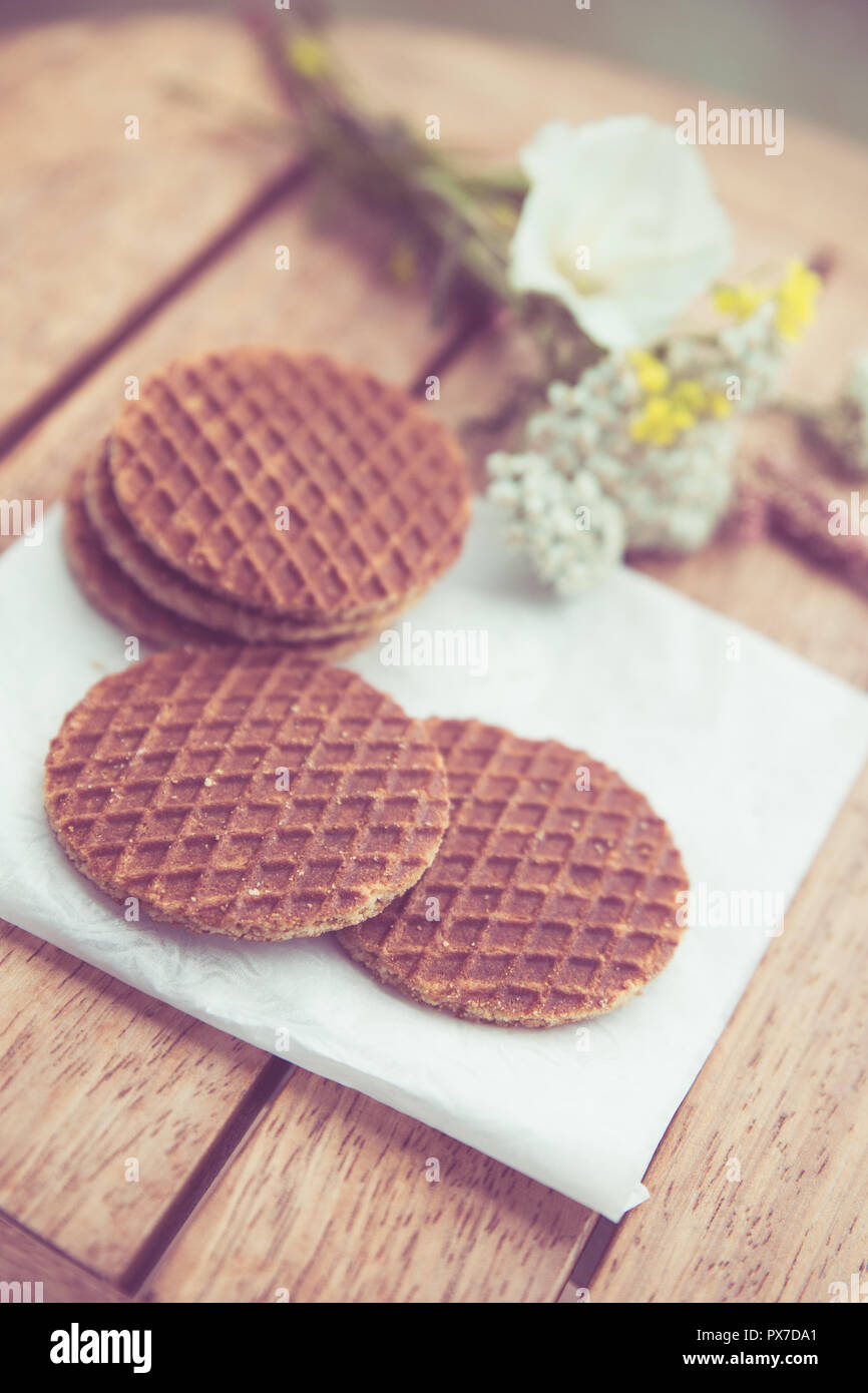 Traditional Dutch Stroopwafels syrup filled waffle cookies in setting ...