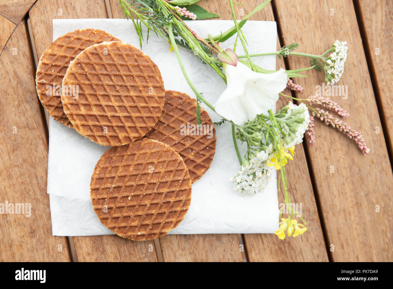 Traditional Dutch Stroopwafels syrup filled waffle cookies in setting ...