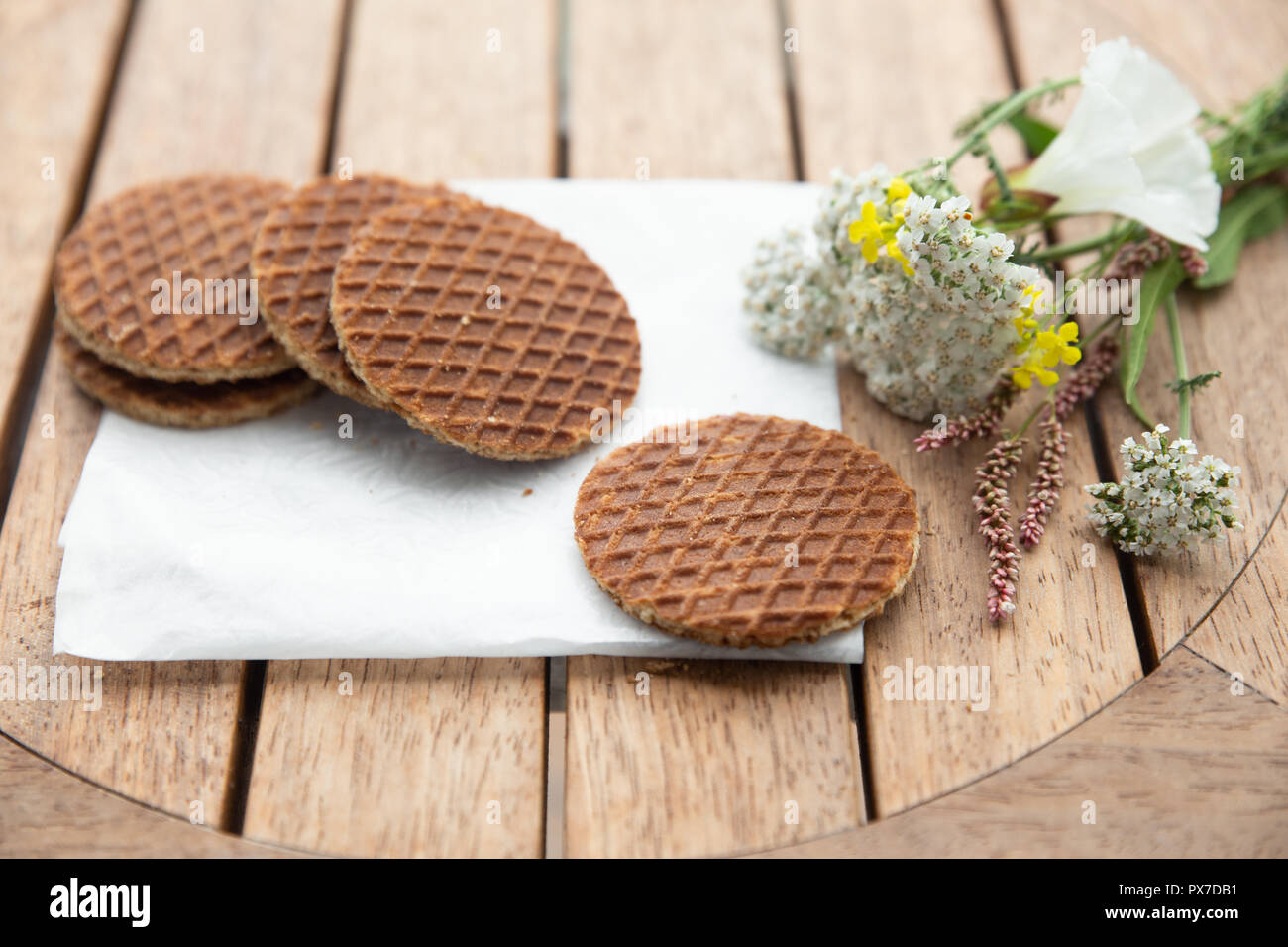 Traditional Dutch Stroopwafels syrup filled waffle cookies in setting ...