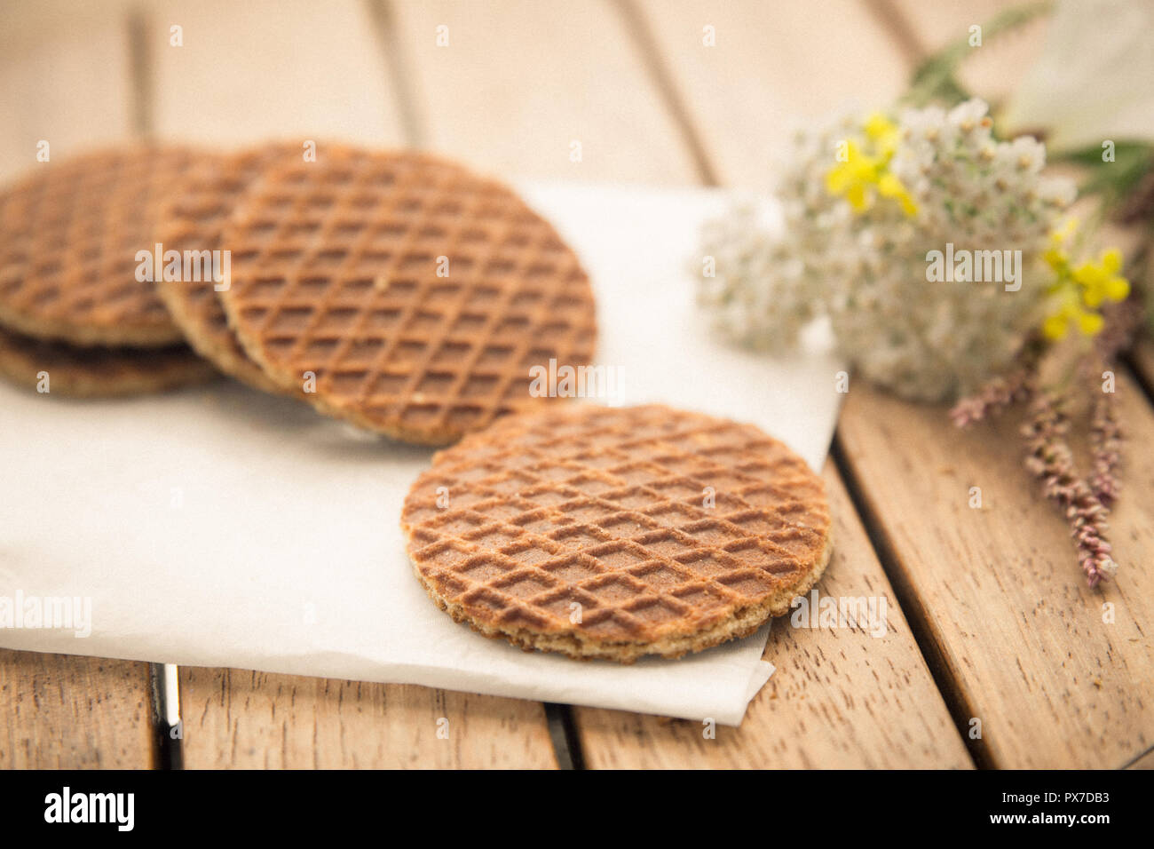 Traditional Dutch Stroopwafels syrup filled waffle cookies in setting ...