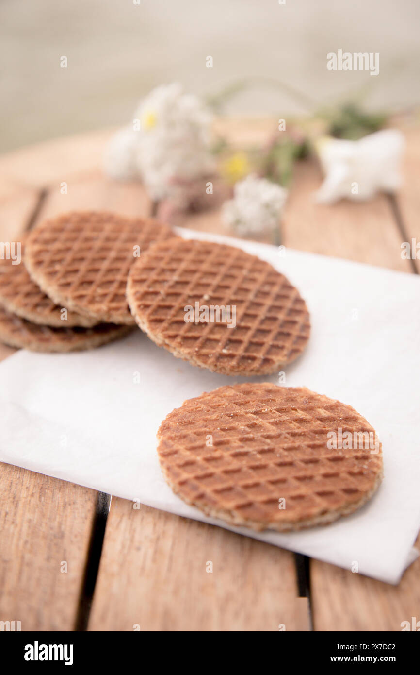 Traditional Dutch Stroopwafels syrup filled waffle cookies in setting ...